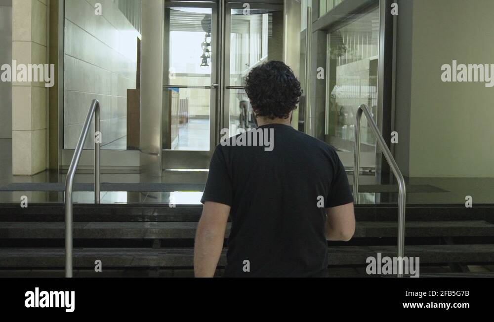 Steps man entering Stock Videos & Footage - HD and 4K Video Clips - Alamy