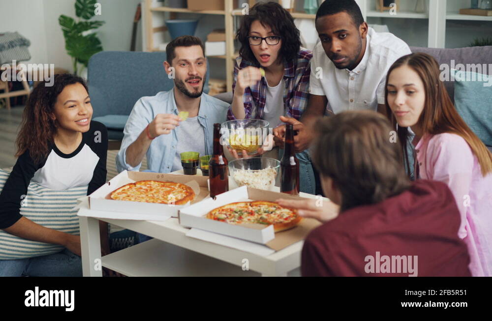 Young women eating crisps Stock Videos & Footage - HD and 4K Video ...