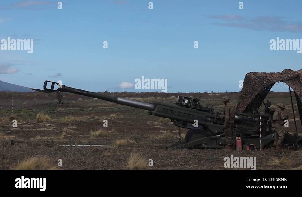 U.S. Army soldiers fire M777 Howitzer during Operation Lightning Strike ...