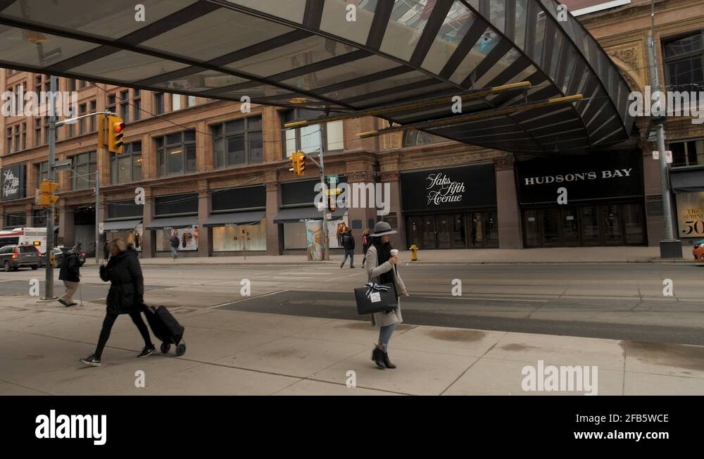 Tilt up to the pedestrian walkway into The Bay from the Eaton Centre ...