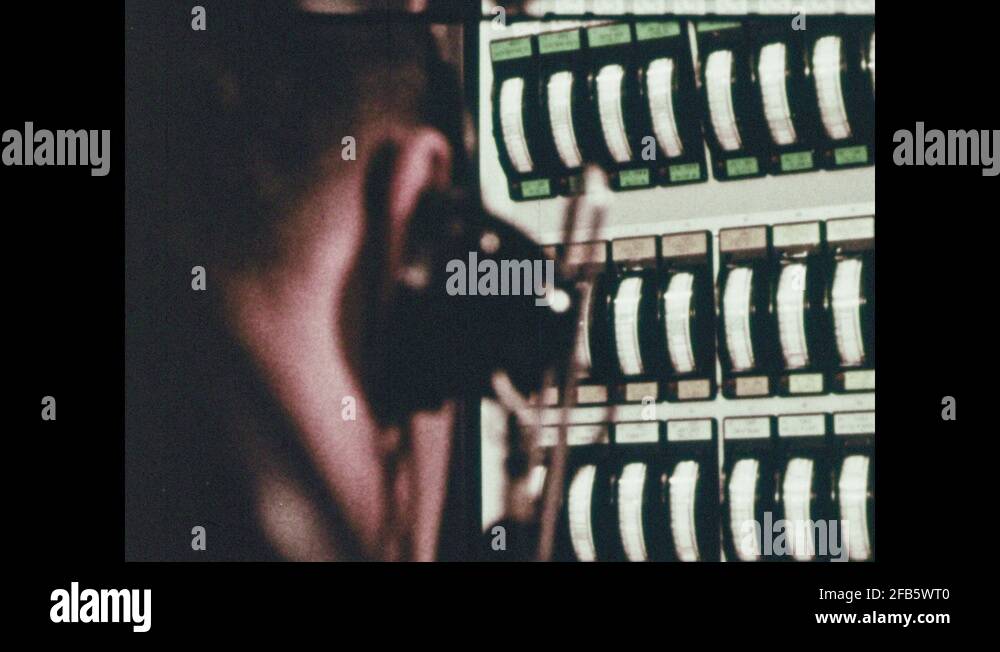 1960s: MEXICO: dots on screen. Men with headsets. Men at mission ...