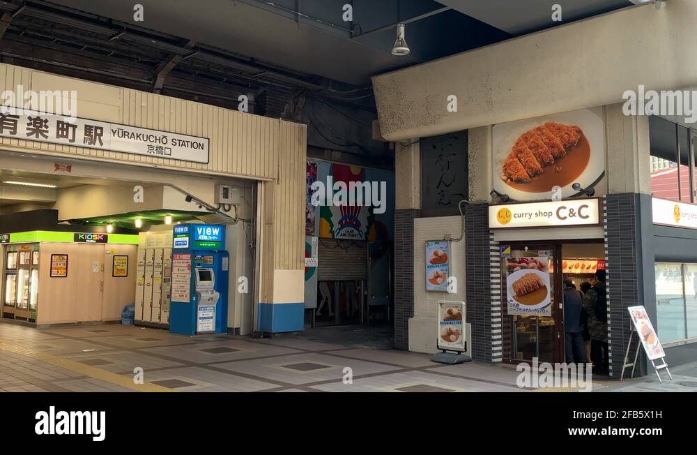 People walk around the Kyobashi gate of Yurakucho Station. JR, Metro ...