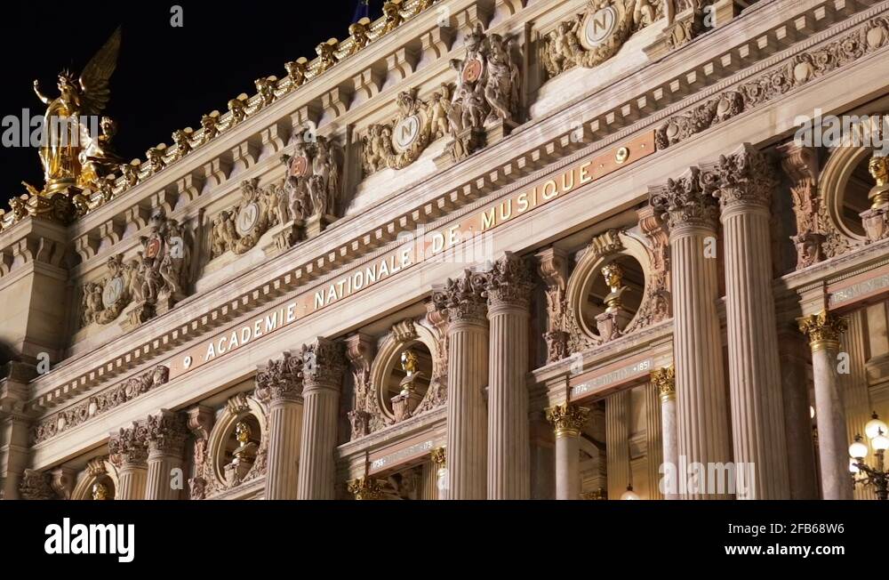 Golden statues and sculptures on the facade of the Opera Garnier in ...