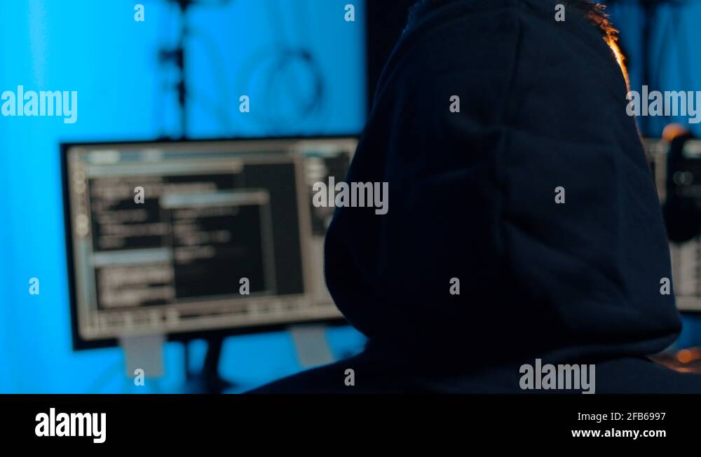 asian hacker in dark room with computers at night Stock Video Footage ...