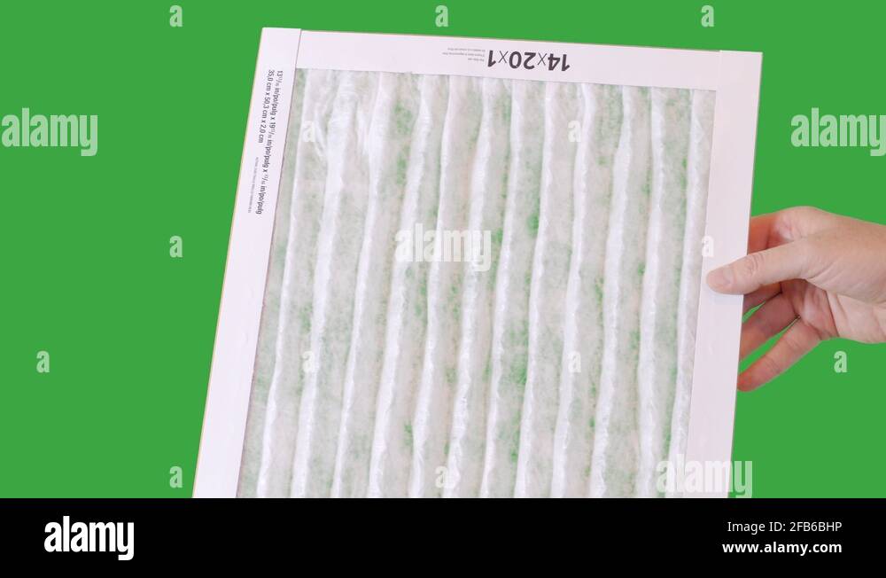 Green screen hand holding clean air filter for house Stock Video ...