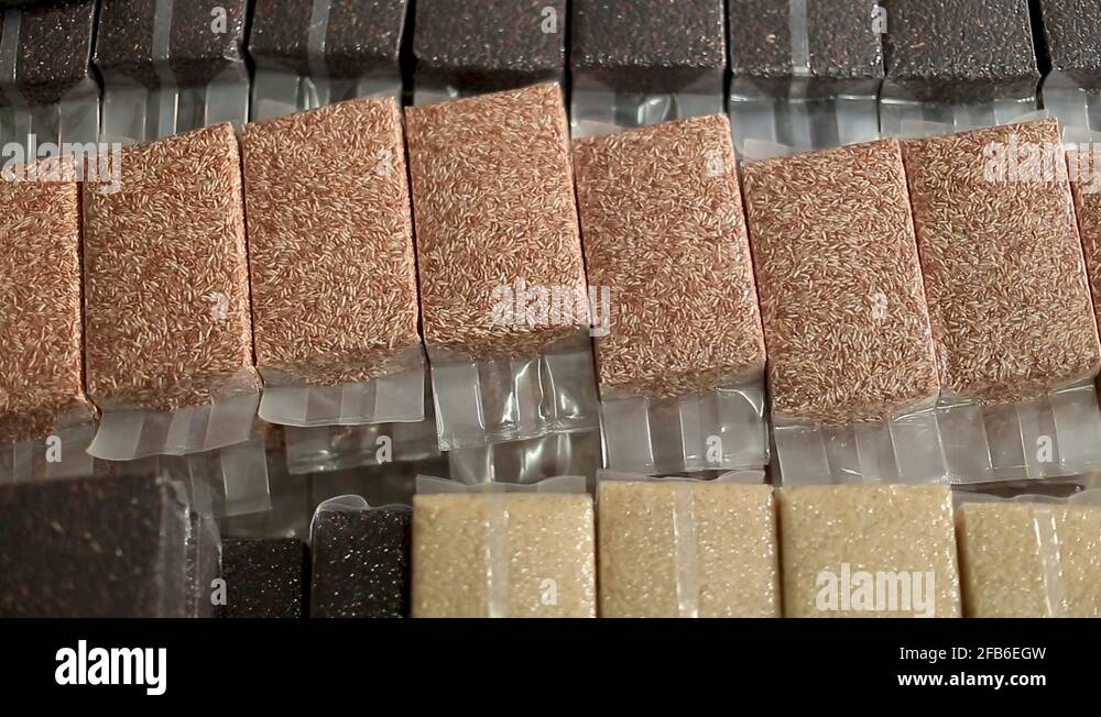 The different kinds of rice pack in the clear packaging to show theirs ...