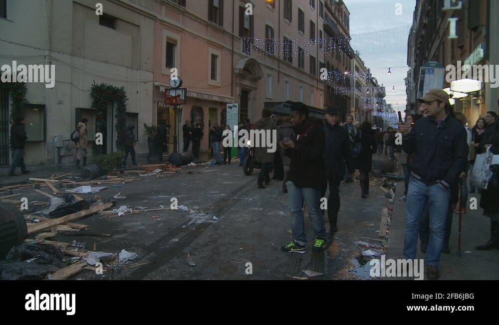 Rome Riot aftermath. Motor bike passes damaged City Stock Video Footage ...