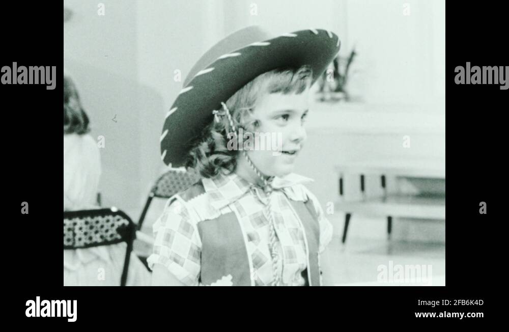 1960s: Girl in cowboy attire speaks. Ventriloquist dummy turns head ...