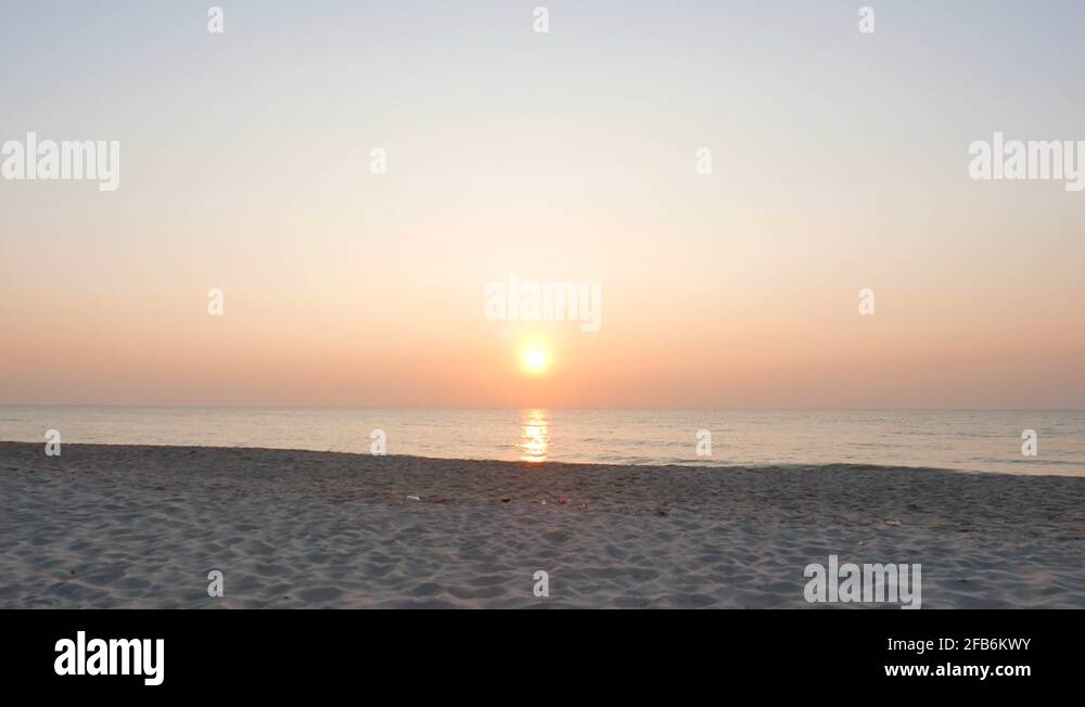 Dawn over beach Stock Videos & Footage - HD and 4K Video Clips - Alamy