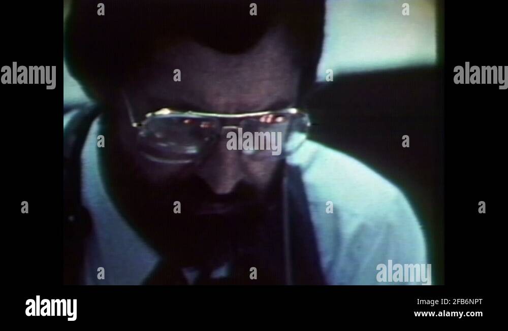1980s: Mission control room. Men sit and speak Stock Video Footage - Alamy