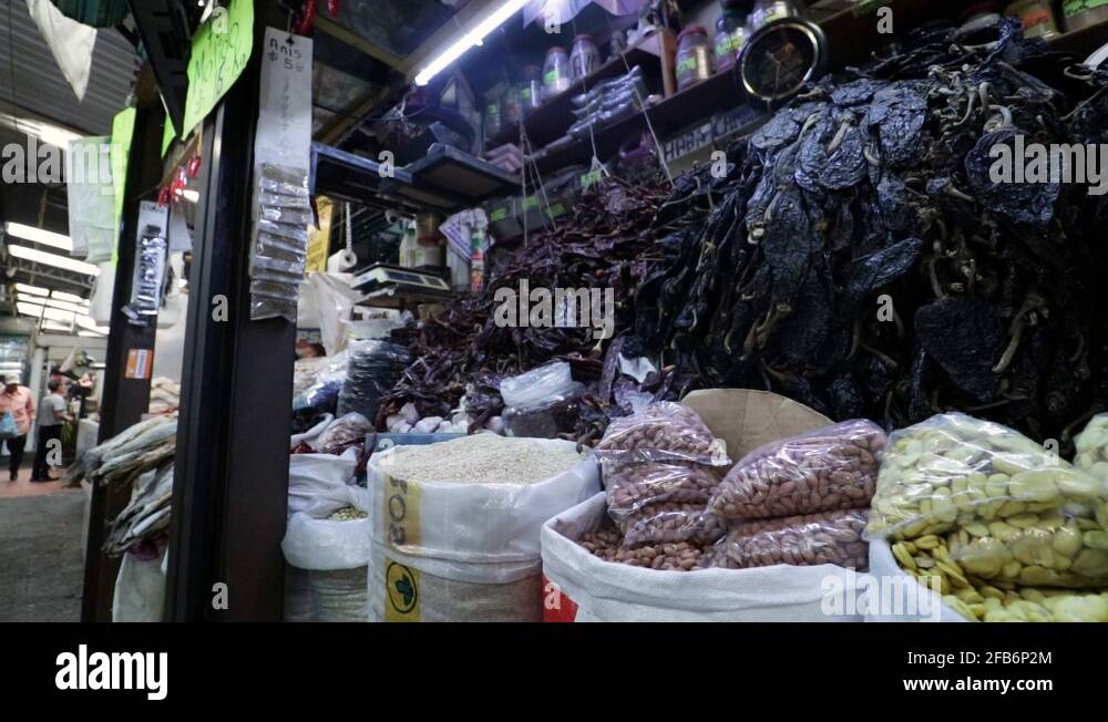 Panoramic view from left to right. Dried food on a stall. Food market ...