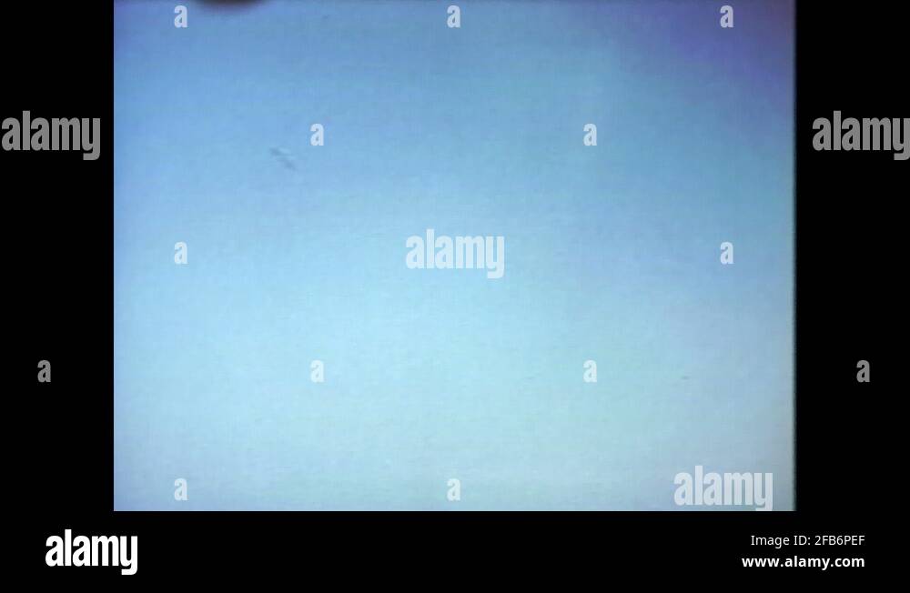 1980s: Space shuttle flies through sky. Looking out window of space ...