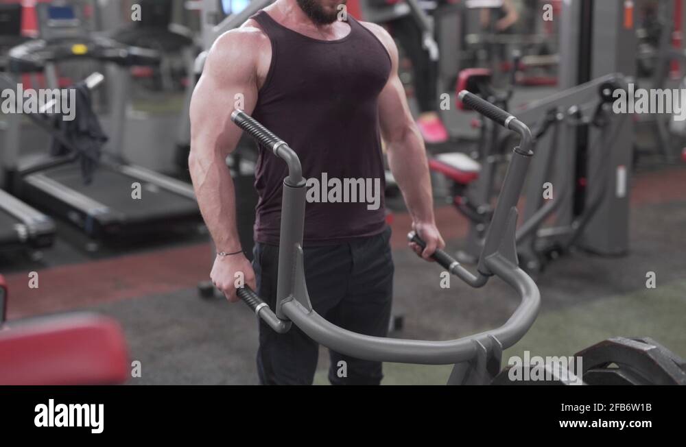 Bodybuilder in gym working out on legs machine Stock Videos & Footage ...