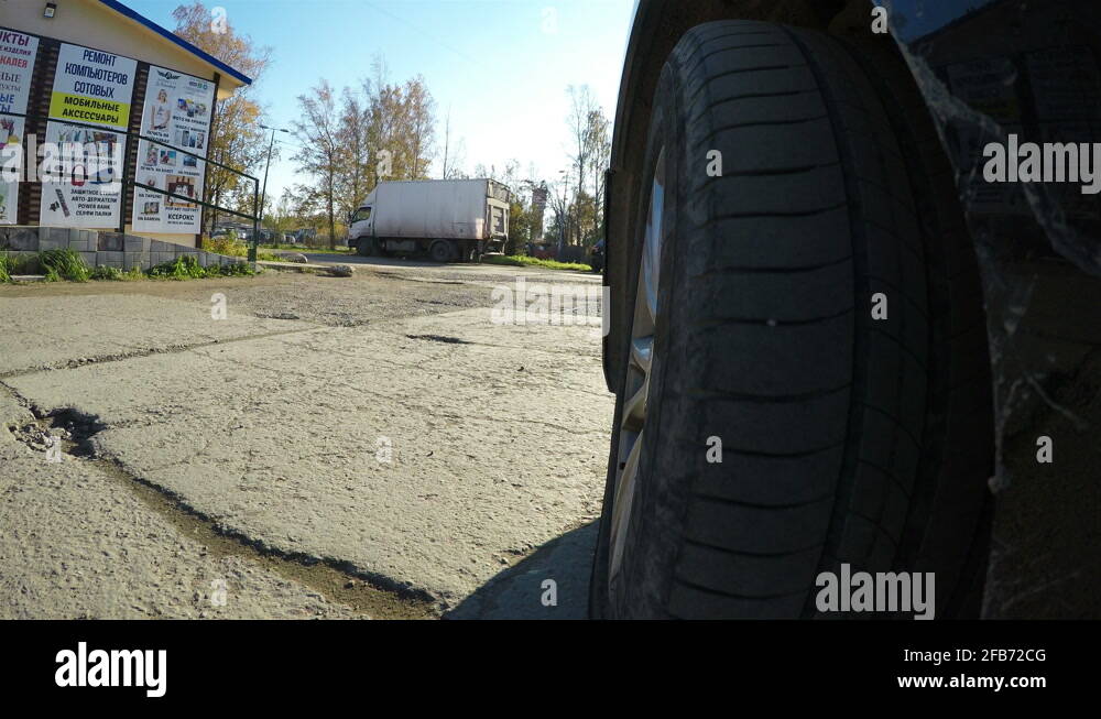 The wheel of the car is rotating on the pavement Stock Video Footage ...
