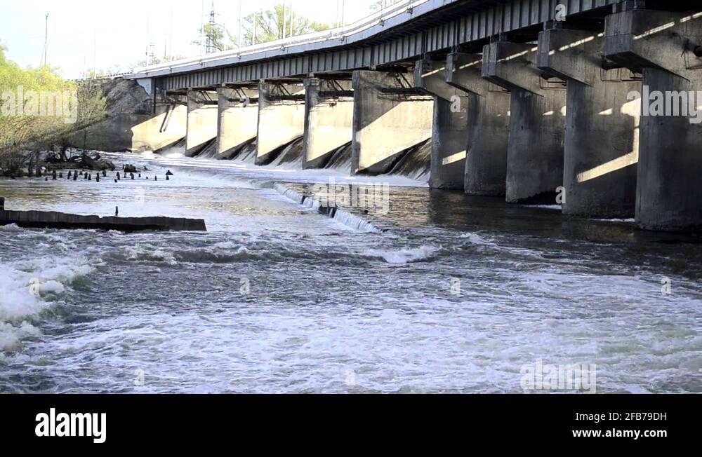 Hydroelectric power station. Water overflows over the dam Stock Video ...