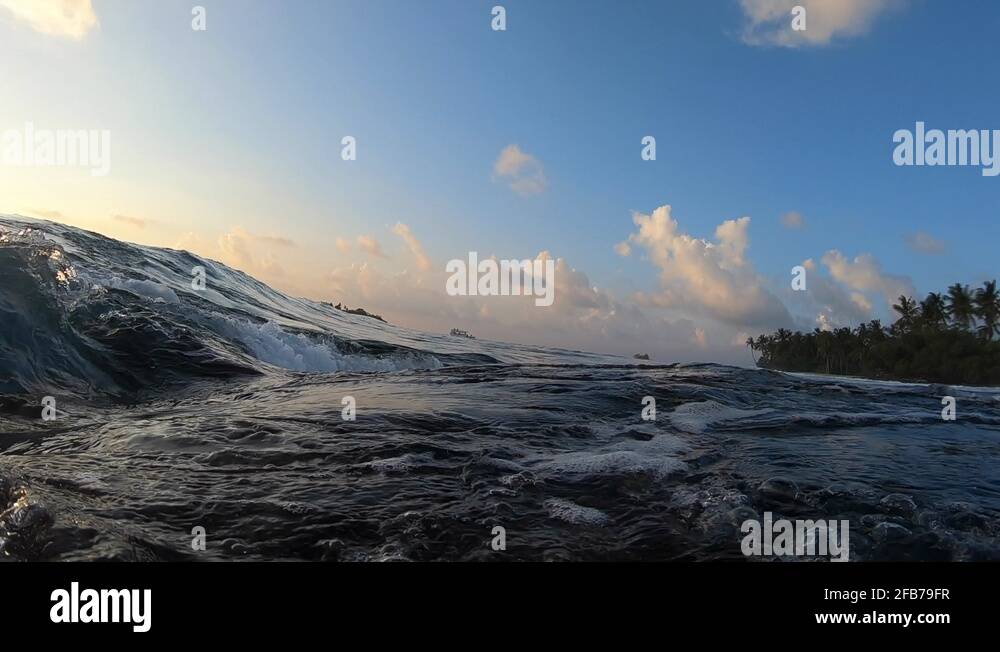 Ocean wave breaks over reef Stock Videos & Footage - HD and 4K Video ...