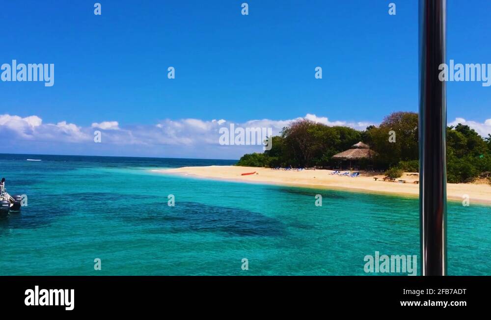 Tropical Island Approach From Caribbean Ocean Stock Video Footage - Alamy