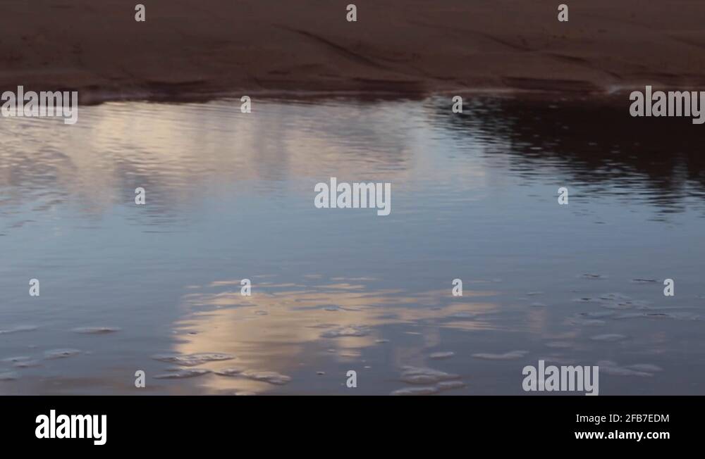 Ocean puddle Stock Videos & Footage - HD and 4K Video Clips - Alamy