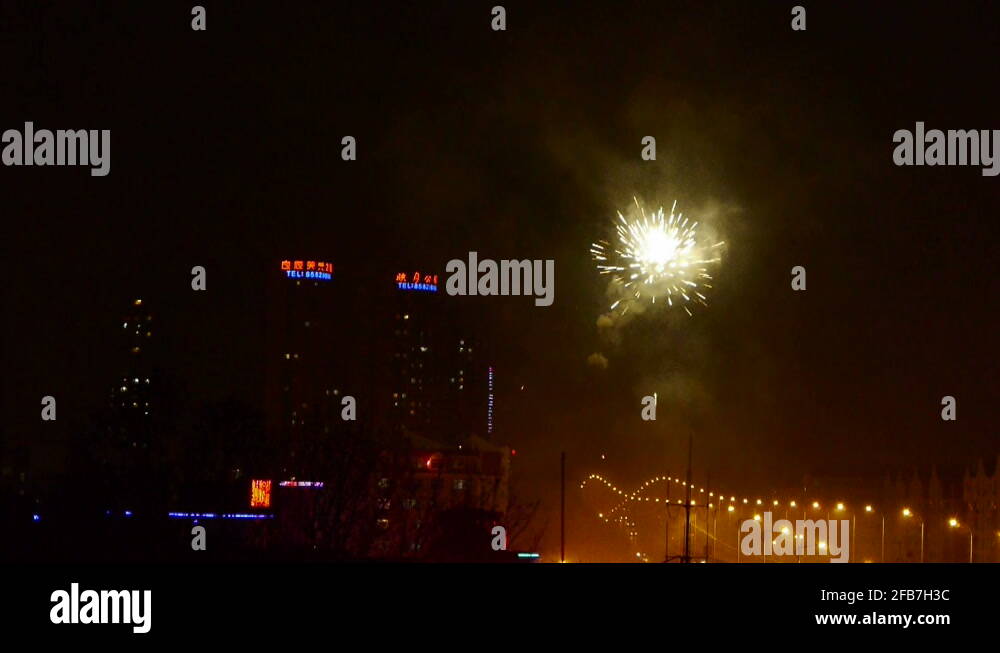 Fireworks over city building at night,bridge,viaduct,street-light Stock ...