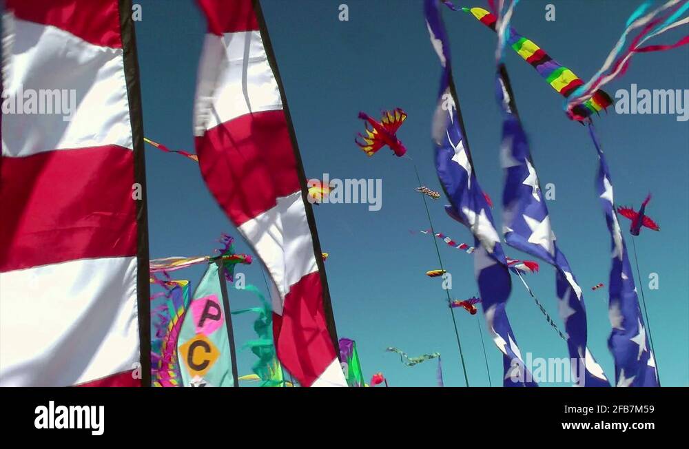 Kites and banners blowing in the wind Stock Video Footage - Alamy