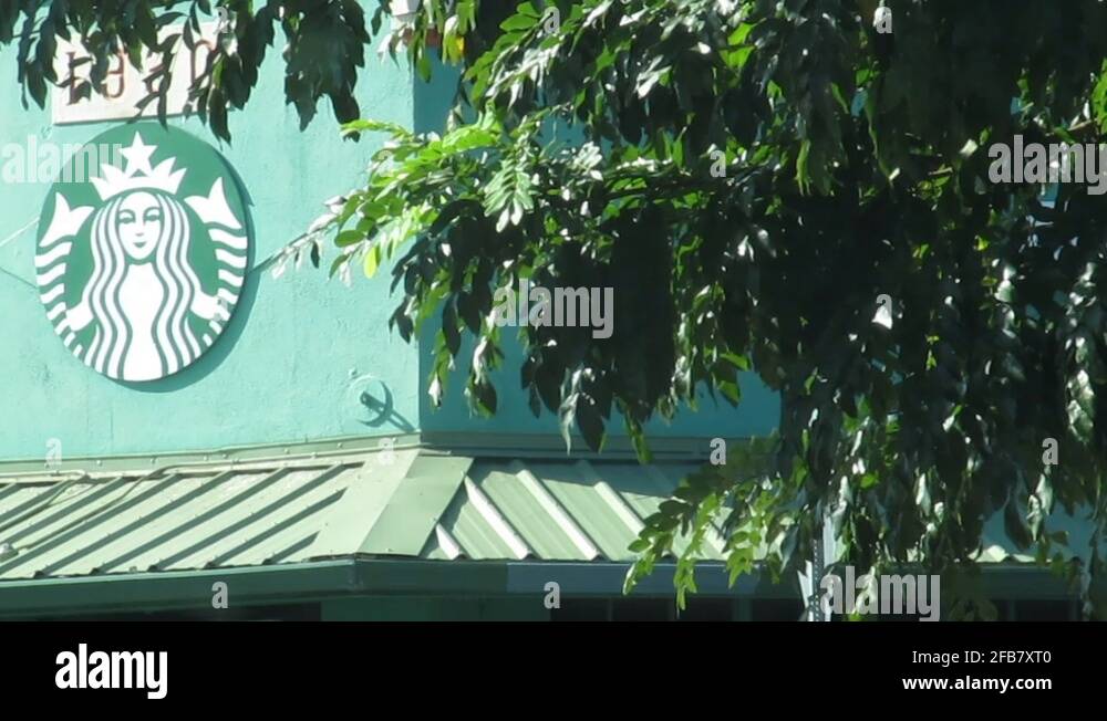 Starbuck's icon logo on top of building Stock Video Footage - Alamy