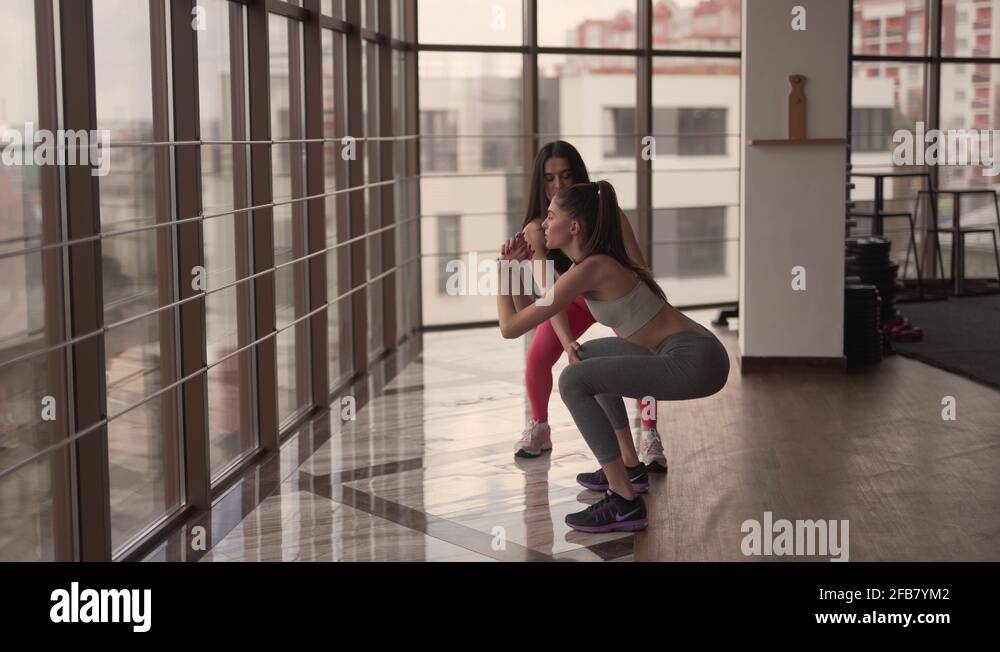 Seated squats Stock Videos & Footage - HD and 4K Video Clips - Alamy