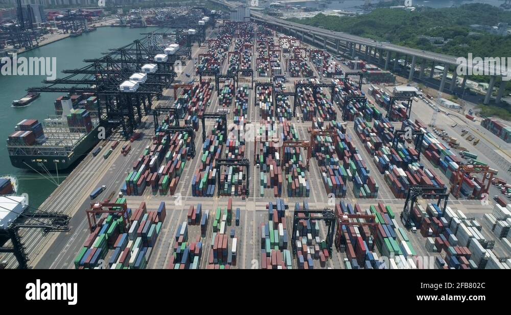 Shipping containers on dock container terminal top view Stock Video ...