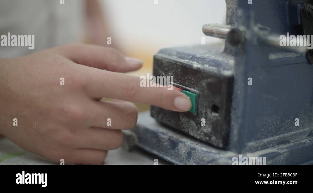 Industrial Start Stop Button. Finger Pushing Button In Factory Stock ...