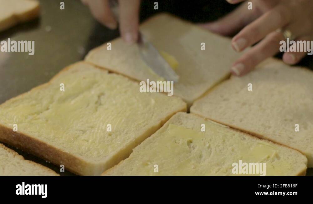 Buttering bread Stock Videos & Footage - HD and 4K Video Clips - Alamy