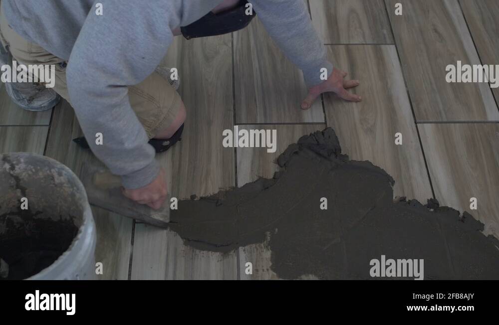 Grouting tile Stock Videos & Footage - HD and 4K Video Clips - Alamy