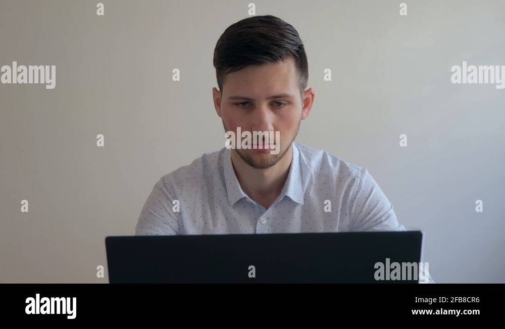 Man sitting in front of computer Stock Videos & Footage - HD and 4K ...