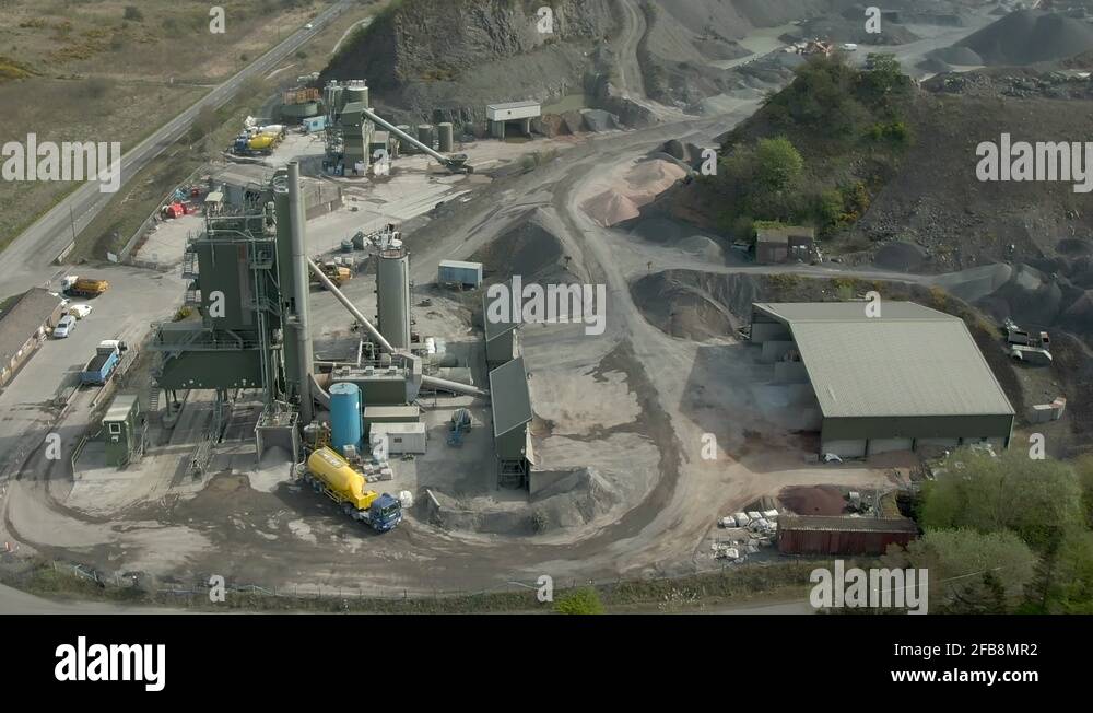 An aerial view of a working concrete, asphalt and aggregate quarry ...