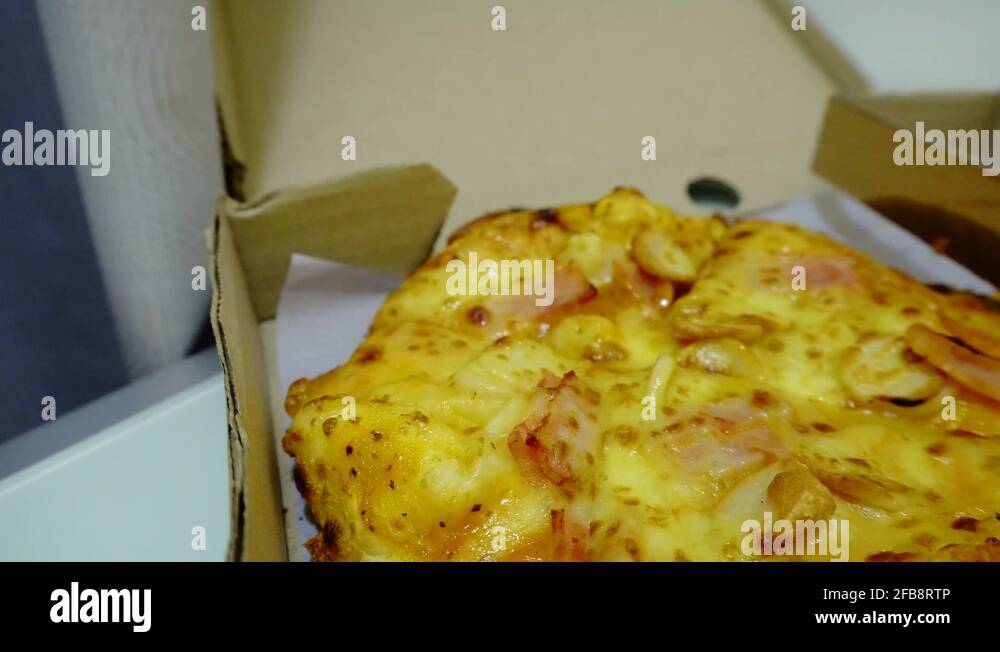 cheese pizza on table, junk food Stock Video Footage - Alamy