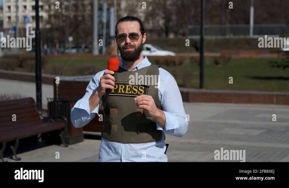 Journalist reporting war zone Stock Videos & Footage - HD and 4K Video ...