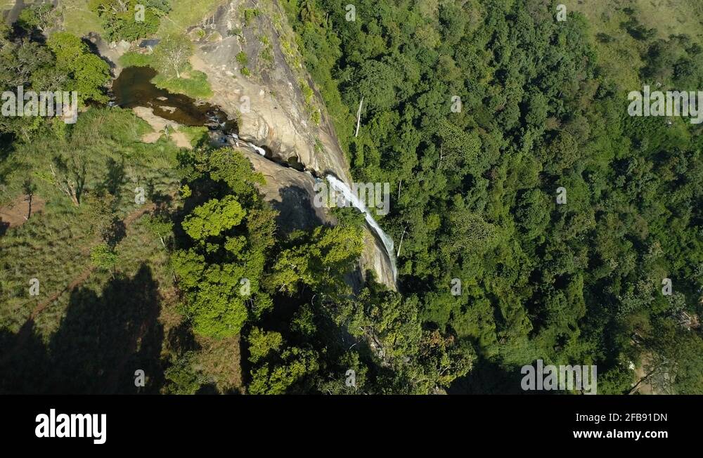 Diyaluma Falls, wide aerial pan view of tall Waterfall in Sri Lanka 4k ...