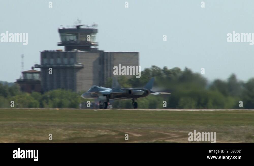 Fifth-generation aircraft Su-57 accelerates along runway and takes off ...