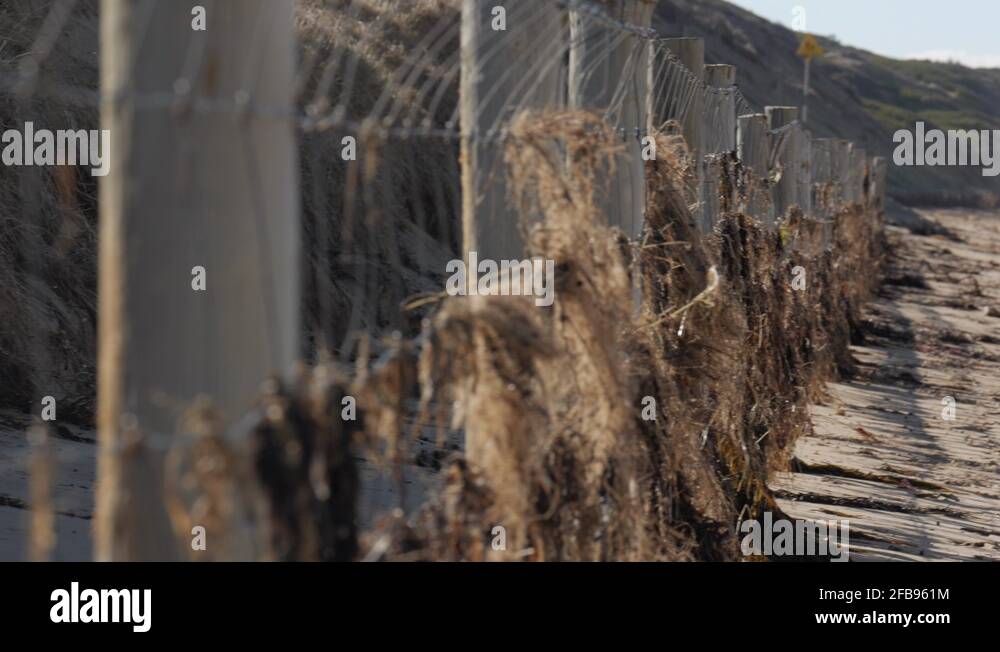 Dunes fence erosion Stock Videos & Footage - HD and 4K Video Clips - Alamy