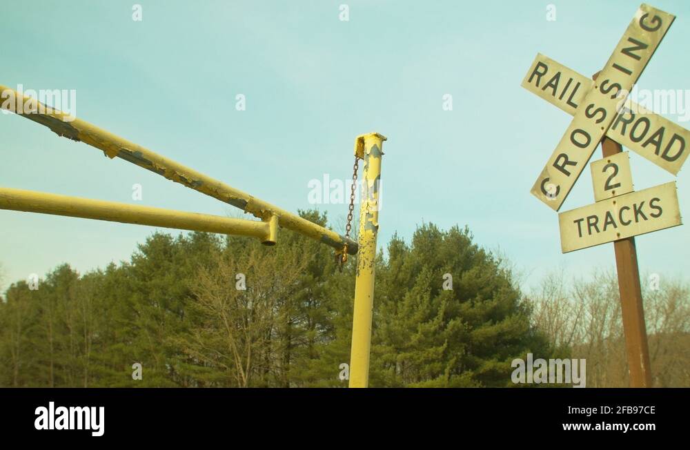 Railroad Crossing Sign and Metal Gate SLIDE LEFT Stock Video Footage ...