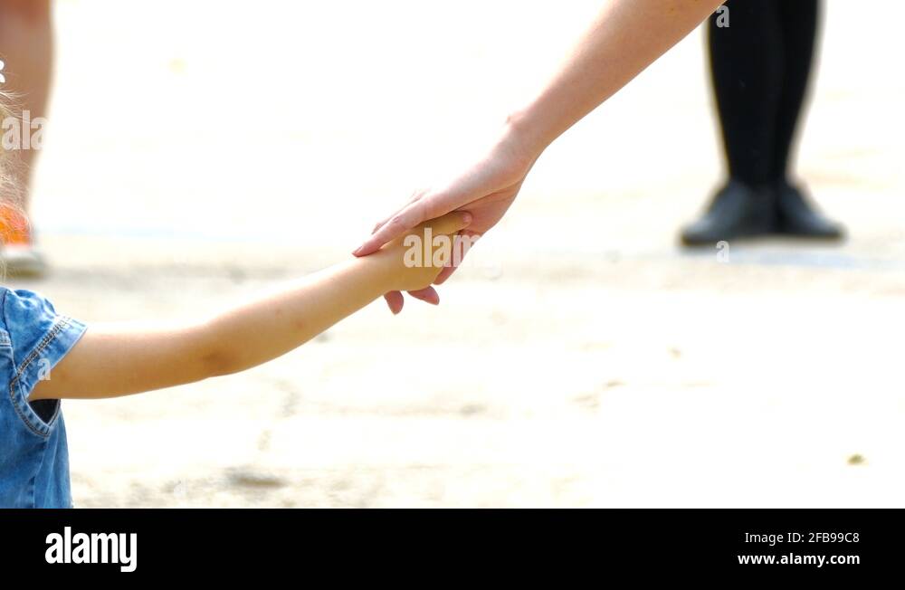 Adult support child hands Stock Videos & Footage - HD and 4K Video ...