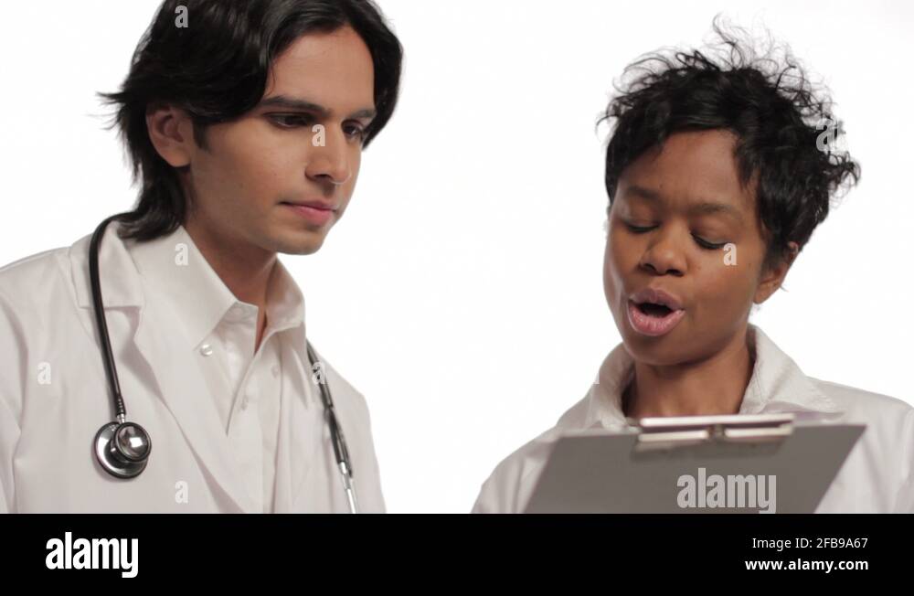 Two doctors talking Stock Videos & Footage - HD and 4K Video Clips - Alamy