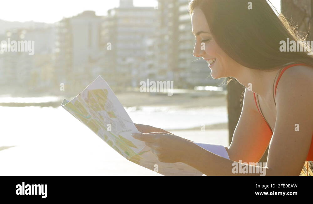 Tourist checking map Stock Videos & Footage - HD and 4K Video Clips - Alamy
