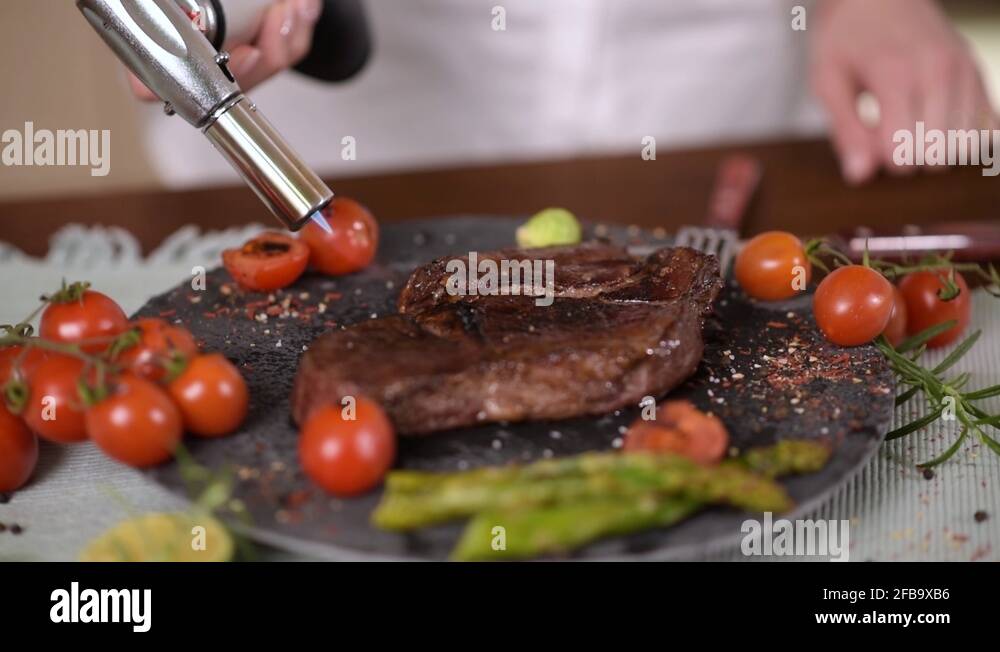 Steak cooking woman Stock Videos & Footage - HD and 4K Video Clips - Alamy