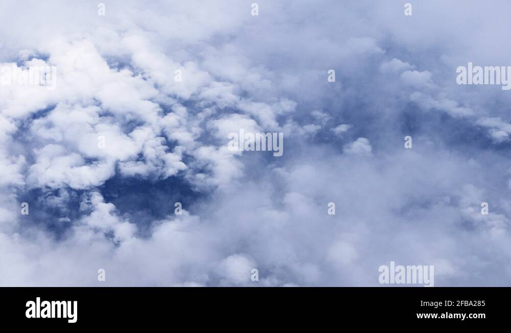 Moving layers of clouds seen from above in high sky. Weather video ...
