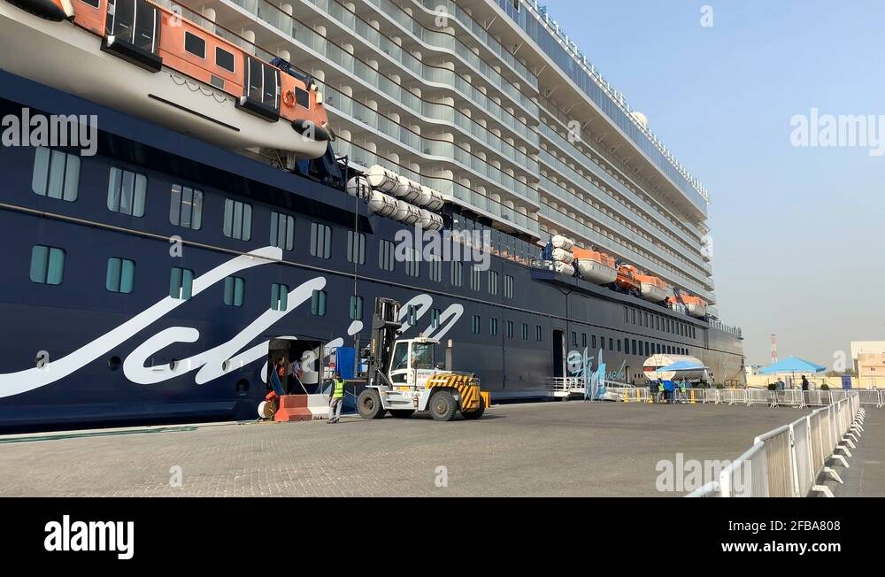 Forklift loading goods onto a cruise ship at Port Saeed in Dubai, UAE ...