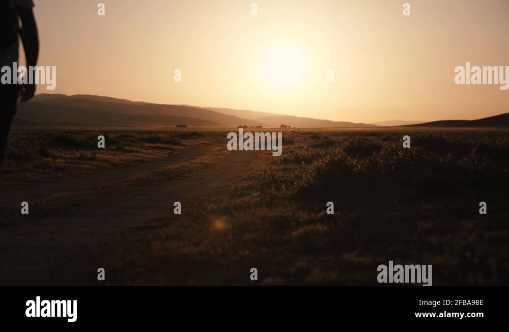 Man walking on path towards Stock Videos & Footage - HD and 4K Video ...