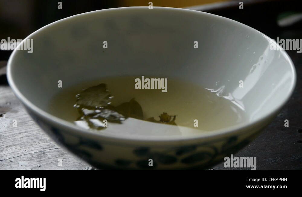 A bowl of shaking tea.china,japan,water,steaming Stock Video Footage ...