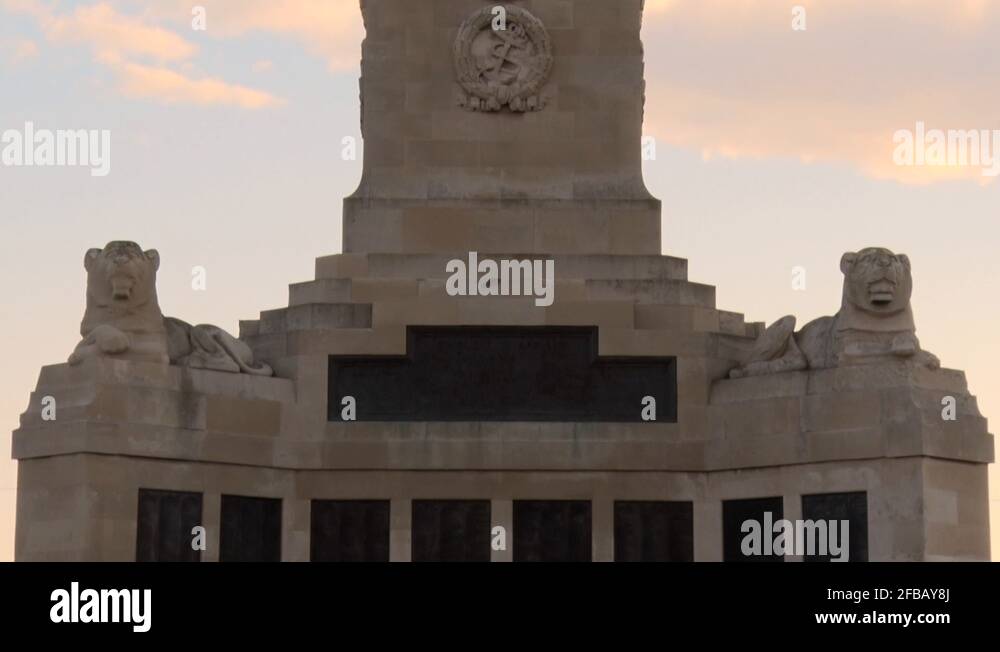 Tilt up reveal of the Portsmouth Naval War Memorial main tower/plinth ...