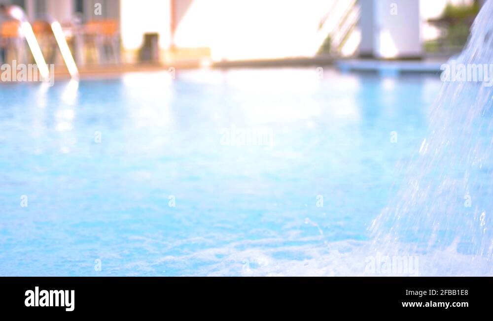 water splashes in the pool Summer Travel Concept at the pool Tourism ...