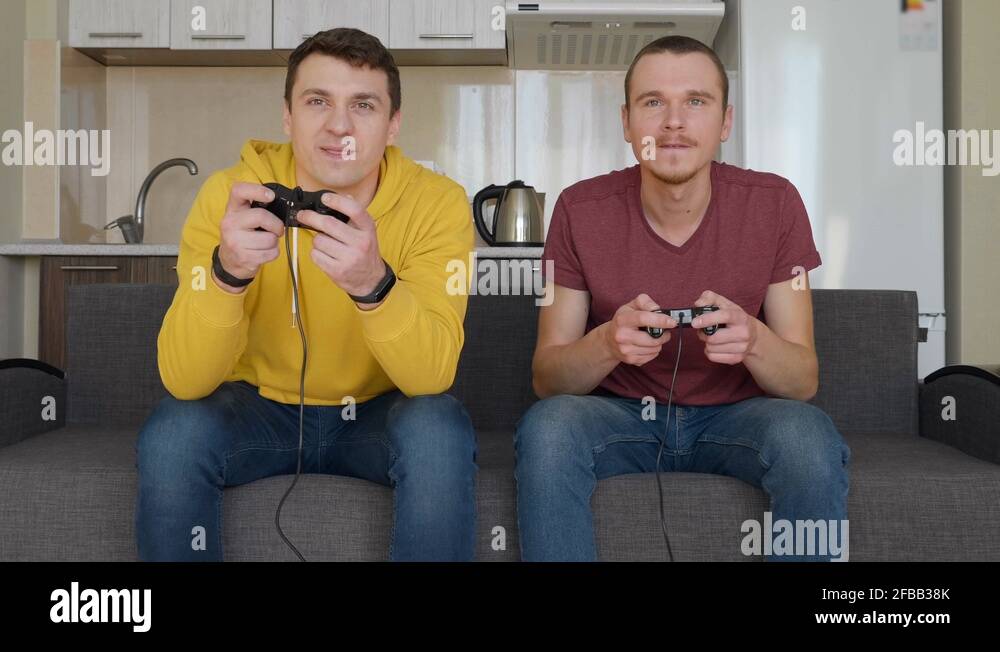 Men at play Stock Videos & Footage - HD and 4K Video Clips - Alamy