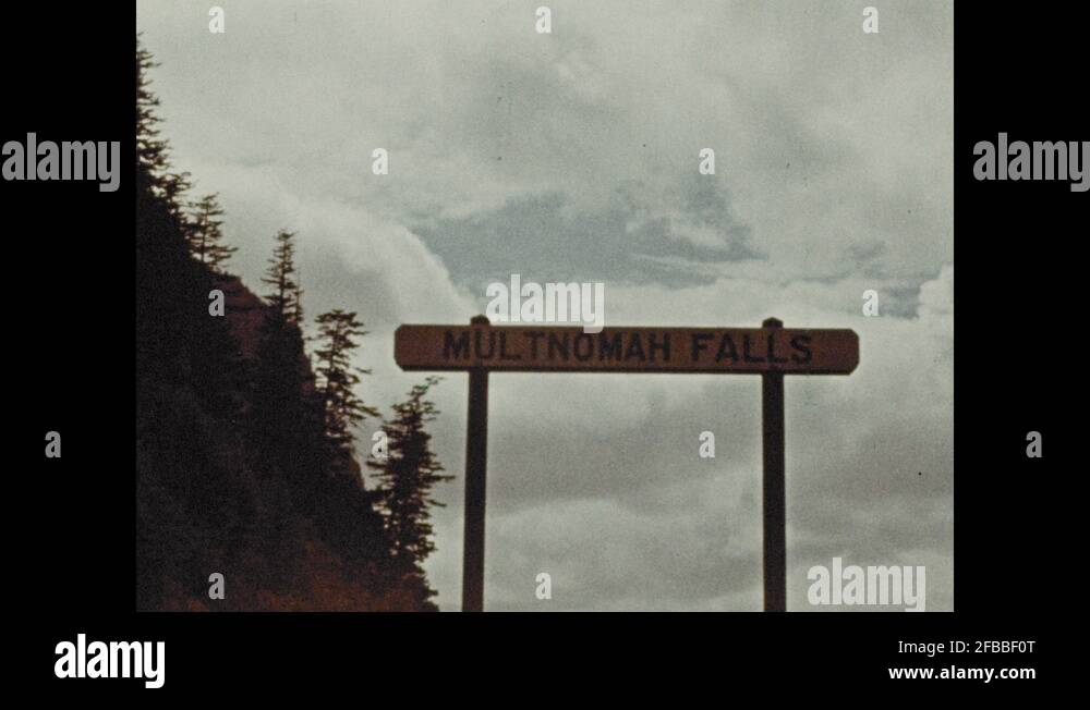 1940s: View of sign. Exterior of lodge, tilt up to waterfall Stock ...